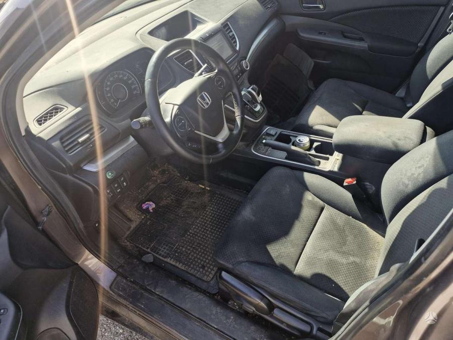 Brown Honda CR-V 2015 in Marijampole, with an engine capacity of 1.60 L and mileage of 450 thousand km for 5500 €, photo 17 on AUTOMOTO.COM.LV
