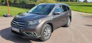Brown Honda CR-V 2015 in Plunge, with an engine capacity of 2.35 L and mileage of 121 thousand km for 14500 €, photo  on AUTOMOTO.COM.LV