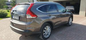 Brown Honda CR-V 2015 in Plunge, with an engine capacity of 2.35 L and mileage of 121 thousand km for 14500 €, photo 4 on AUTOMOTO.COM.LV
