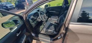 Brown Honda CR-V 2015 in Plunge, with an engine capacity of 2.35 L and mileage of 121 thousand km for 14500 €, photo 6 on AUTOMOTO.COM.LV