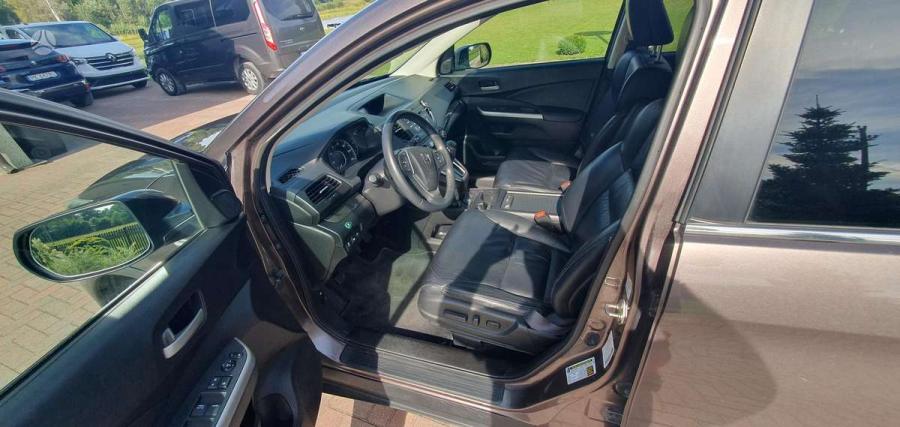 Brown Honda CR-V 2015 in Plunge, with an engine capacity of 2.35 L and mileage of 121 thousand km for 14500 €, photo 6 on AUTOMOTO.COM.LV