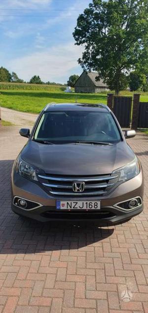 Brown Honda CR-V 2015 in Plunge, with an engine capacity of 2.35 L and mileage of 121 thousand km for 14500 €, photo 11 on AUTOMOTO.COM.LV