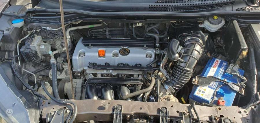 Brown Honda CR-V 2015 in Plunge, with an engine capacity of 2.35 L and mileage of 121 thousand km for 14500 €, photo 12 on AUTOMOTO.COM.LV