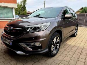 Brown Honda CR-V 2015 in Vilnius, with an engine capacity of 1.60 L and mileage of 180 thousand km for 13800 €, photo  on AUTOMOTO.COM.LV