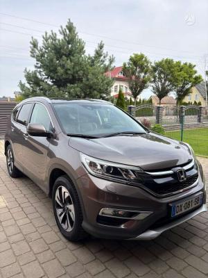 Brown Honda CR-V 2015 in Vilnius, with an engine capacity of 1.60 L and mileage of 180 thousand km for 13800 €, photo 3 on AUTOMOTO.COM.LV