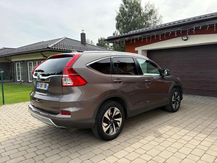 Brown Honda CR-V 2015 in Vilnius, with an engine capacity of 1.60 L and mileage of 180 thousand km for 13800 €, photo 4 on AUTOMOTO.COM.LV