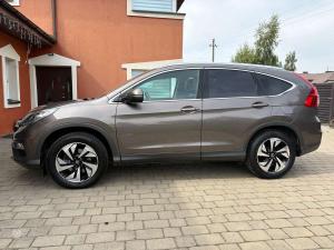 Brown Honda CR-V 2015 in Vilnius, with an engine capacity of 1.60 L and mileage of 180 thousand km for 13800 €, photo 5 on AUTOMOTO.COM.LV