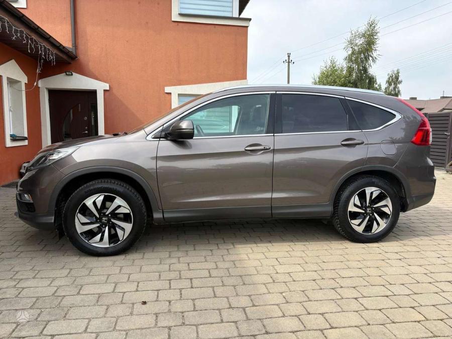 Brown Honda CR-V 2015 in Vilnius, with an engine capacity of 1.60 L and mileage of 180 thousand km for 13800 €, photo 5 on AUTOMOTO.COM.LV