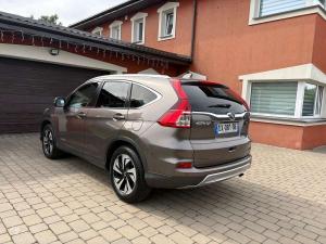 Brown Honda CR-V 2015 in Vilnius, with an engine capacity of 1.60 L and mileage of 180 thousand km for 13800 €, photo 6 on AUTOMOTO.COM.LV
