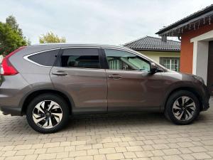 Brown Honda CR-V 2015 in Vilnius, with an engine capacity of 1.60 L and mileage of 180 thousand km for 13800 €, photo 7 on AUTOMOTO.COM.LV