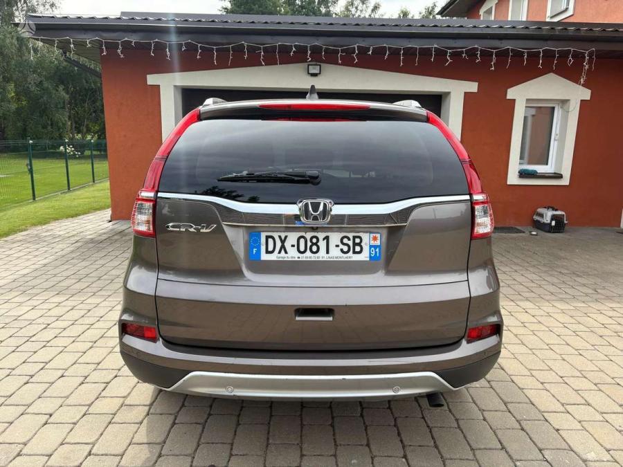 Brown Honda CR-V 2015 in Vilnius, with an engine capacity of 1.60 L and mileage of 180 thousand km for 13800 €, photo 9 on AUTOMOTO.COM.LV