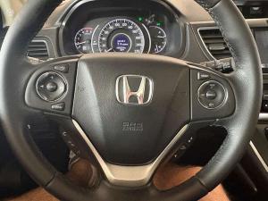 Brown Honda CR-V 2015 in Vilnius, with an engine capacity of 1.60 L and mileage of 180 thousand km for 13800 €, photo 20 on AUTOMOTO.COM.LV
