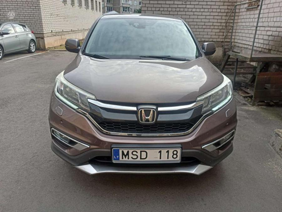Brown Honda CR-V 2015 in Kaunas, with an engine capacity of 1.60 L and mileage of 262 thousand km for 9300 €, photo 3 on AUTOMOTO.COM.LV