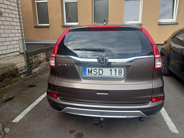 Brown Honda CR-V 2015 in Kaunas, with an engine capacity of 1.60 L and mileage of 262 thousand km for 9300 €, photo 6 on AUTOMOTO.COM.LV