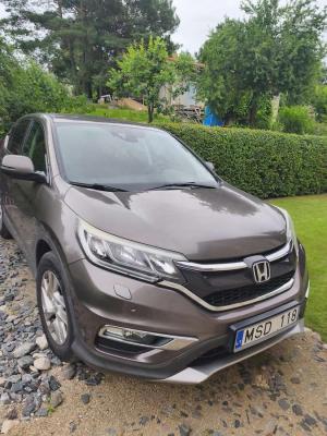 Brown Honda CR-V 2015 in Kaunas, with an engine capacity of 1.60 L and mileage of 262 thousand km for 9300 €, photo 7 on AUTOMOTO.COM.LV