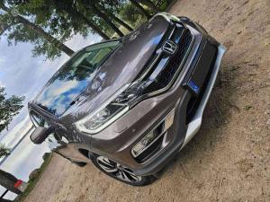 Brūns Honda CR-V 2015 Molėtai, ar dzinēja tilpumu 1.60 L un nobraukumu 150 tūkst. km par 11300 €, foto  vietnē AUTOMOTO.COM.LV