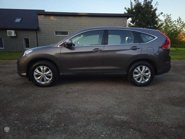 Brūns Honda CR-V 2015 Radviliškis, ar dzinēja tilpumu 1.60 L un nobraukumu 270 tūkst. km par 7900 €, foto 6 vietnē AUTOMOTO.COM.LV