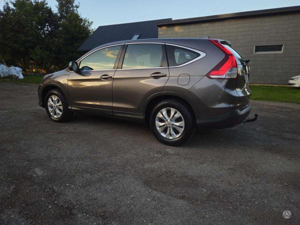 Brūns Honda CR-V 2015 Radviliškis, ar dzinēja tilpumu 1.60 L un nobraukumu 270 tūkst. km par 7900 €, foto 7 vietnē AUTOMOTO.COM.LV