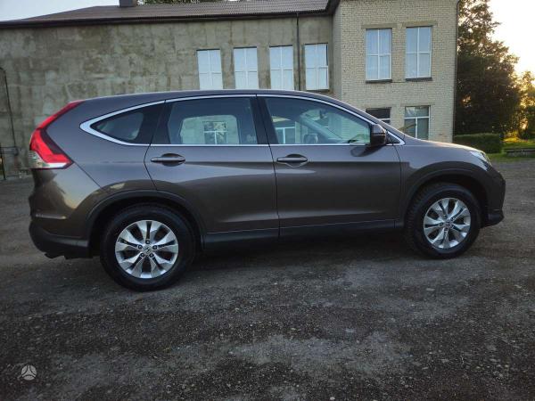 Brūns Honda CR-V 2015 Radviliškis, ar dzinēja tilpumu 1.60 L un nobraukumu 270 tūkst. km par 7900 €, foto 10 vietnē AUTOMOTO.COM.LV