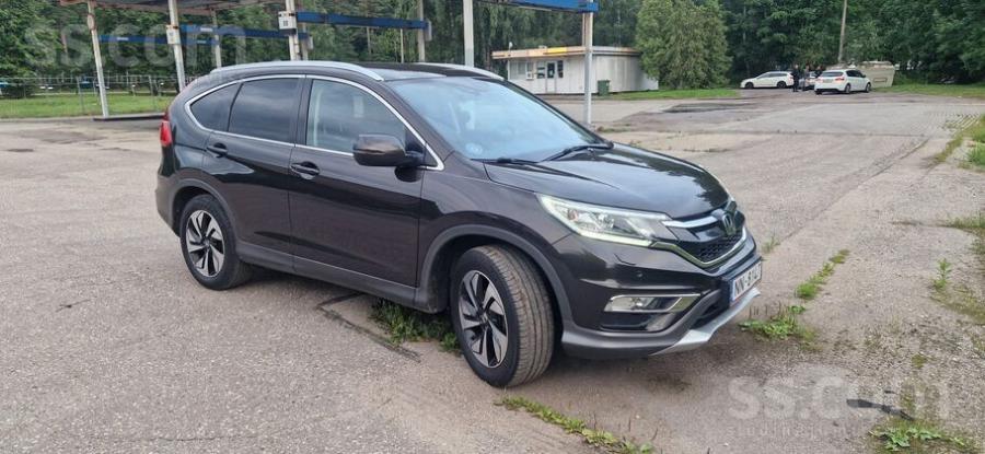 Brown Honda CR-V 2016 in Riga, with an engine capacity of 2.00 L and mileage of 196 thousand km for 15900 €, photo 1 on AUTOMOTO.COM.LV