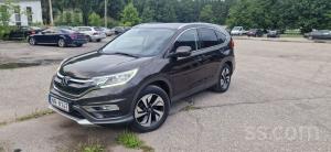 Brown Honda CR-V 2016 in Riga, with an engine capacity of 2.00 L and mileage of 196 thousand km for 15900 €, photo 3 on AUTOMOTO.COM.LV