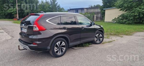Brūns Honda CR-V 2016 Rīga, ar dzinēja tilpumu 2.00 L un nobraukumu 196 tūkst. km par 15900 €, foto 3 vietnē AUTOMOTO.COM.LV