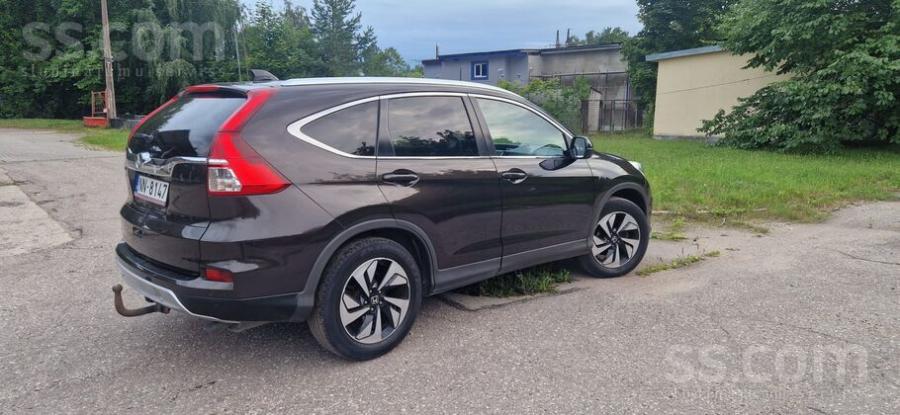 Brown Honda CR-V 2016 in Riga, with an engine capacity of 2.00 L and mileage of 196 thousand km for 15900 €, photo 4 on AUTOMOTO.COM.LV