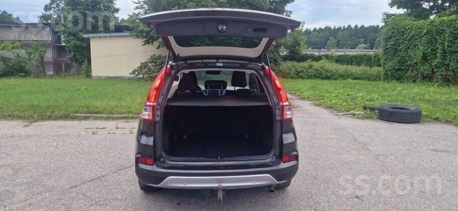 Brown Honda CR-V 2016 in Riga, with an engine capacity of 2.00 L and mileage of 196 thousand km for 15900 €, photo 6 on AUTOMOTO.COM.LV