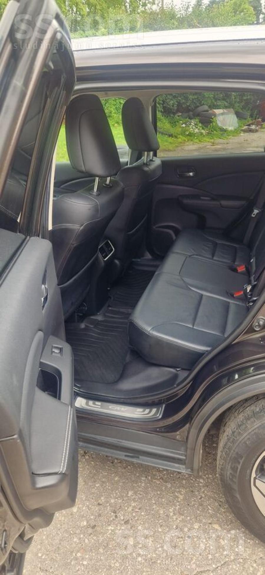 Brown Honda CR-V 2016 in Riga, with an engine capacity of 2.00 L and mileage of 196 thousand km for 15900 €, photo 12 on AUTOMOTO.COM.LV