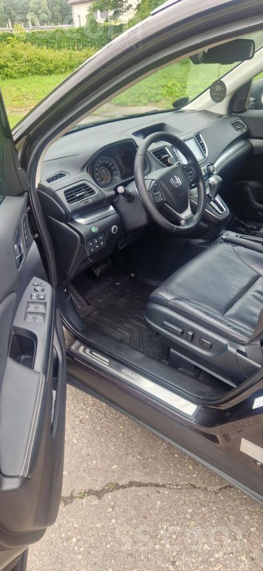 Brown Honda CR-V 2016 in Riga, with an engine capacity of 2.00 L and mileage of 196 thousand km for 15900 €, photo 13 on AUTOMOTO.COM.LV