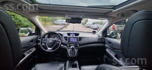 Brown Honda CR-V 2016 in Riga, with an engine capacity of 2.00 L and mileage of 196 thousand km for 15900 €, photo 15 on AUTOMOTO.COM.LV