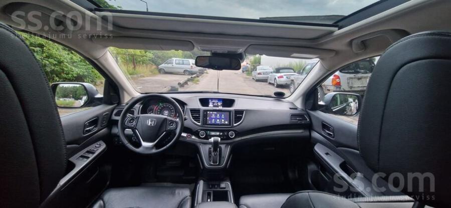 Brown Honda CR-V 2016 in Riga, with an engine capacity of 2.00 L and mileage of 196 thousand km for 15900 €, photo 15 on AUTOMOTO.COM.LV