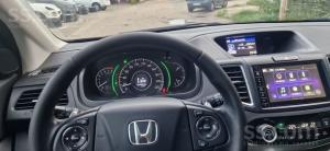 Brown Honda CR-V 2016 in Riga, with an engine capacity of 2.00 L and mileage of 196 thousand km for 15900 €, photo 17 on AUTOMOTO.COM.LV