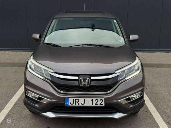 Brown Honda CR-V 2016 in Vilnius, with an engine capacity of 2.40 L and mileage of 230 thousand km for 12900 €, photo 3 on AUTOMOTO.COM.LV