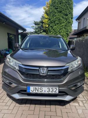 Brown Honda CR-V 2016 in Vilnius, with an engine capacity of 1.60 L and mileage of 322 thousand km for 9100 €, photo  on AUTOMOTO.COM.LV