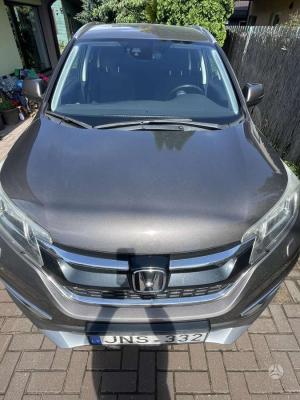 Brown Honda CR-V 2016 in Vilnius, with an engine capacity of 1.60 L and mileage of 322 thousand km for 9100 €, photo 3 on AUTOMOTO.COM.LV
