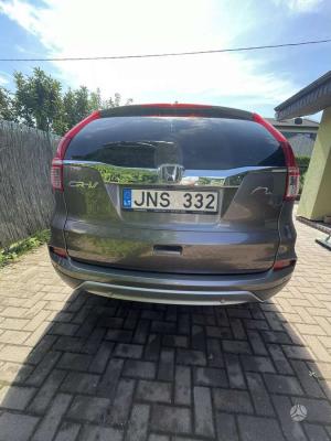 Brown Honda CR-V 2016 in Vilnius, with an engine capacity of 1.60 L and mileage of 322 thousand km for 9100 €, photo 6 on AUTOMOTO.COM.LV
