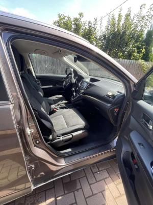 Brown Honda CR-V 2016 in Vilnius, with an engine capacity of 1.60 L and mileage of 322 thousand km for 9100 €, photo 17 on AUTOMOTO.COM.LV