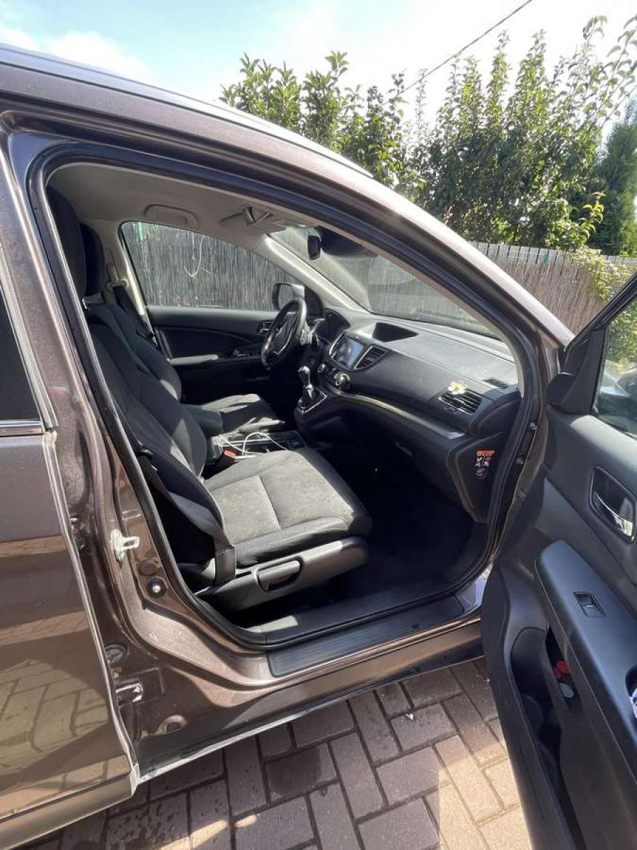 Brown Honda CR-V 2016 in Vilnius, with an engine capacity of 1.60 L and mileage of 322 thousand km for 9100 €, photo 17 on AUTOMOTO.COM.LV