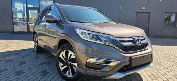 Brown Honda CR-V 2016 in Siauliai, with an engine capacity of 1.60 L and mileage of 212 thousand km for 12999 €, photo 4 on AUTOMOTO.COM.LV