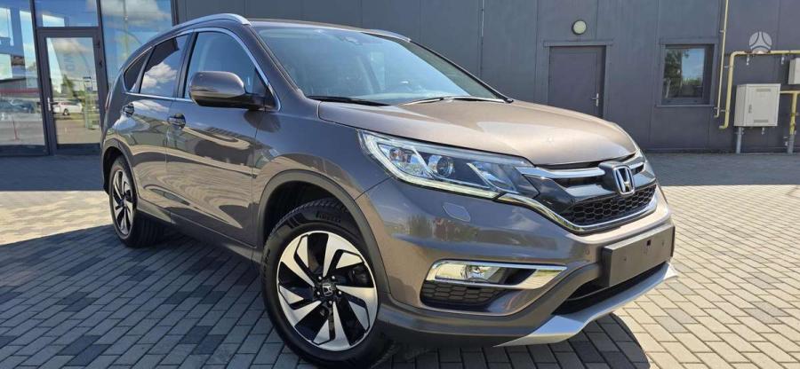 Brown Honda CR-V 2016 in Siauliai, with an engine capacity of 1.60 L and mileage of 212 thousand km for 12999 €, photo 7 on AUTOMOTO.COM.LV