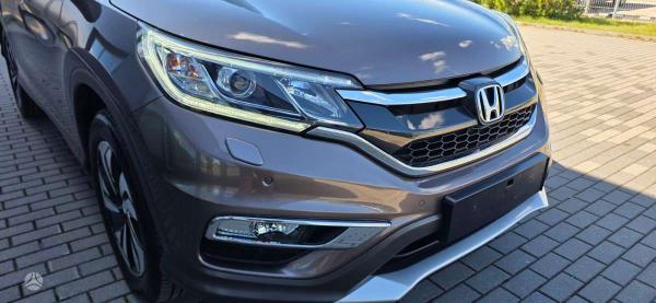 Brown Honda CR-V 2016 in Siauliai, with an engine capacity of 1.60 L and mileage of 212 thousand km for 12999 €, photo 9 on AUTOMOTO.COM.LV