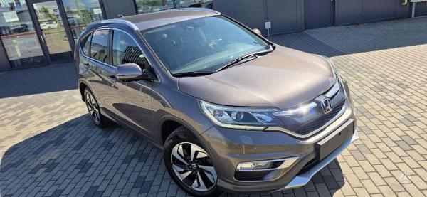 Brown Honda CR-V 2016 in Siauliai, with an engine capacity of 1.60 L and mileage of 212 thousand km for 12999 €, photo 10 on AUTOMOTO.COM.LV