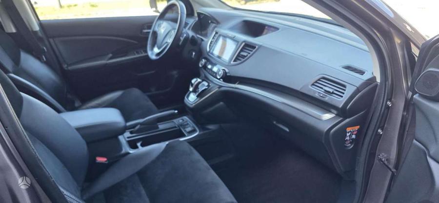 Brown Honda CR-V 2016 in Siauliai, with an engine capacity of 1.60 L and mileage of 212 thousand km for 12999 €, photo 18 on AUTOMOTO.COM.LV