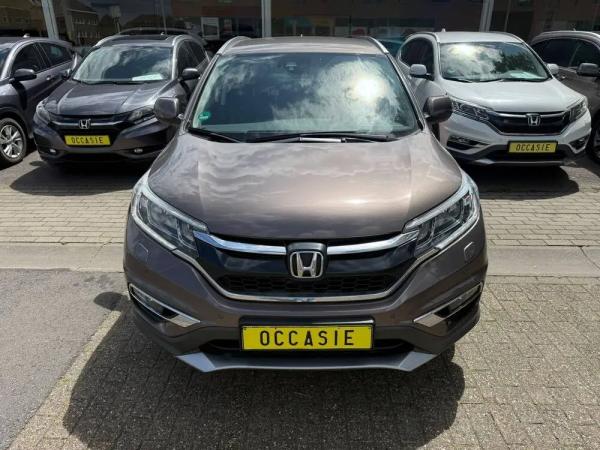 Brown Honda CR-V 2017 in Riga, with an engine capacity of 1.60 L and mileage of 123 thousand km for 12950 €, photo 3 on AUTOMOTO.COM.LV