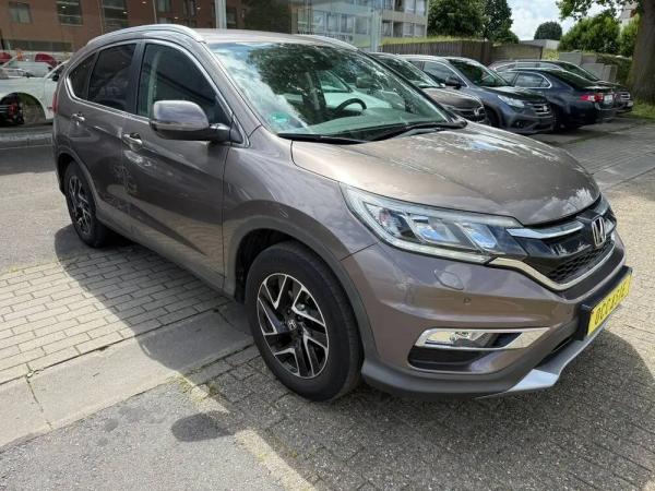 Brown Honda CR-V 2017 in Riga, with an engine capacity of 1.60 L and mileage of 123 thousand km for 12950 €, photo 5 on AUTOMOTO.COM.LV