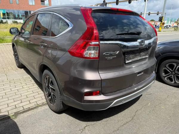 Brown Honda CR-V 2017 in Riga, with an engine capacity of 1.60 L and mileage of 123 thousand km for 12950 €, photo 6 on AUTOMOTO.COM.LV
