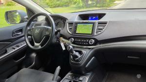 Brown Honda CR-V 2017 in Panevezys, with an engine capacity of 1.60 L and mileage of 260 thousand km for 11200 €, photo 5 on AUTOMOTO.COM.LV