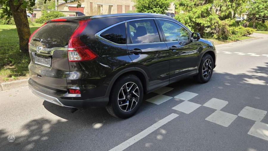 Brown Honda CR-V 2017 in Panevezys, with an engine capacity of 1.60 L and mileage of 260 thousand km for 11200 €, photo 9 on AUTOMOTO.COM.LV