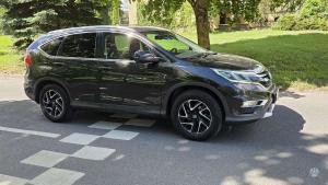 Brown Honda CR-V 2017 in Panevezys, with an engine capacity of 1.60 L and mileage of 260 thousand km for 11200 €, photo 10 on AUTOMOTO.COM.LV